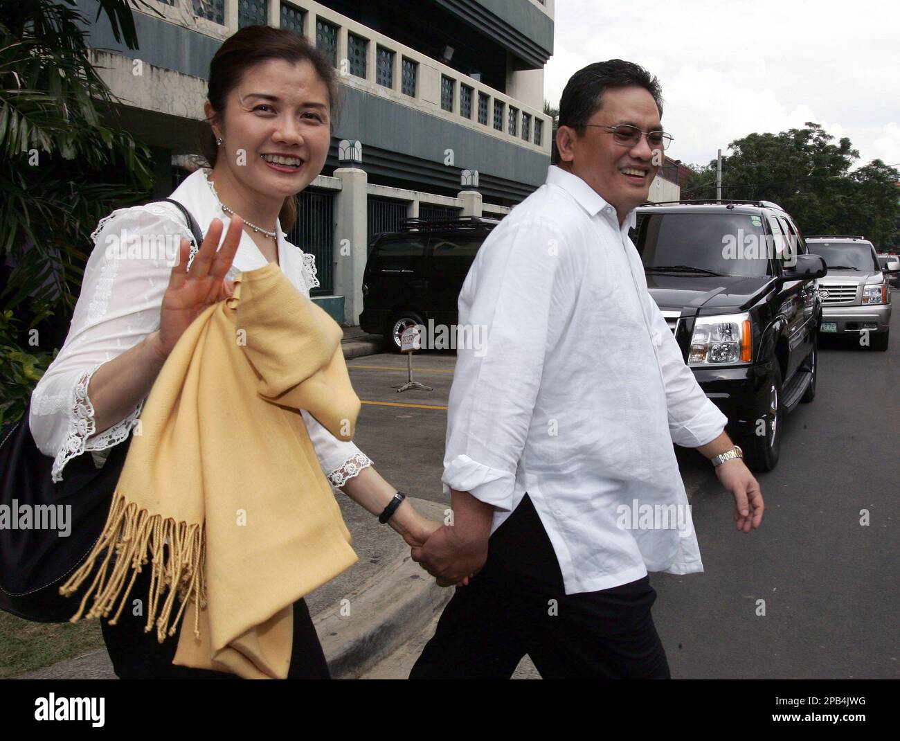 A beaming lawyer Edward Serapio and his wife Grace, leave the ...