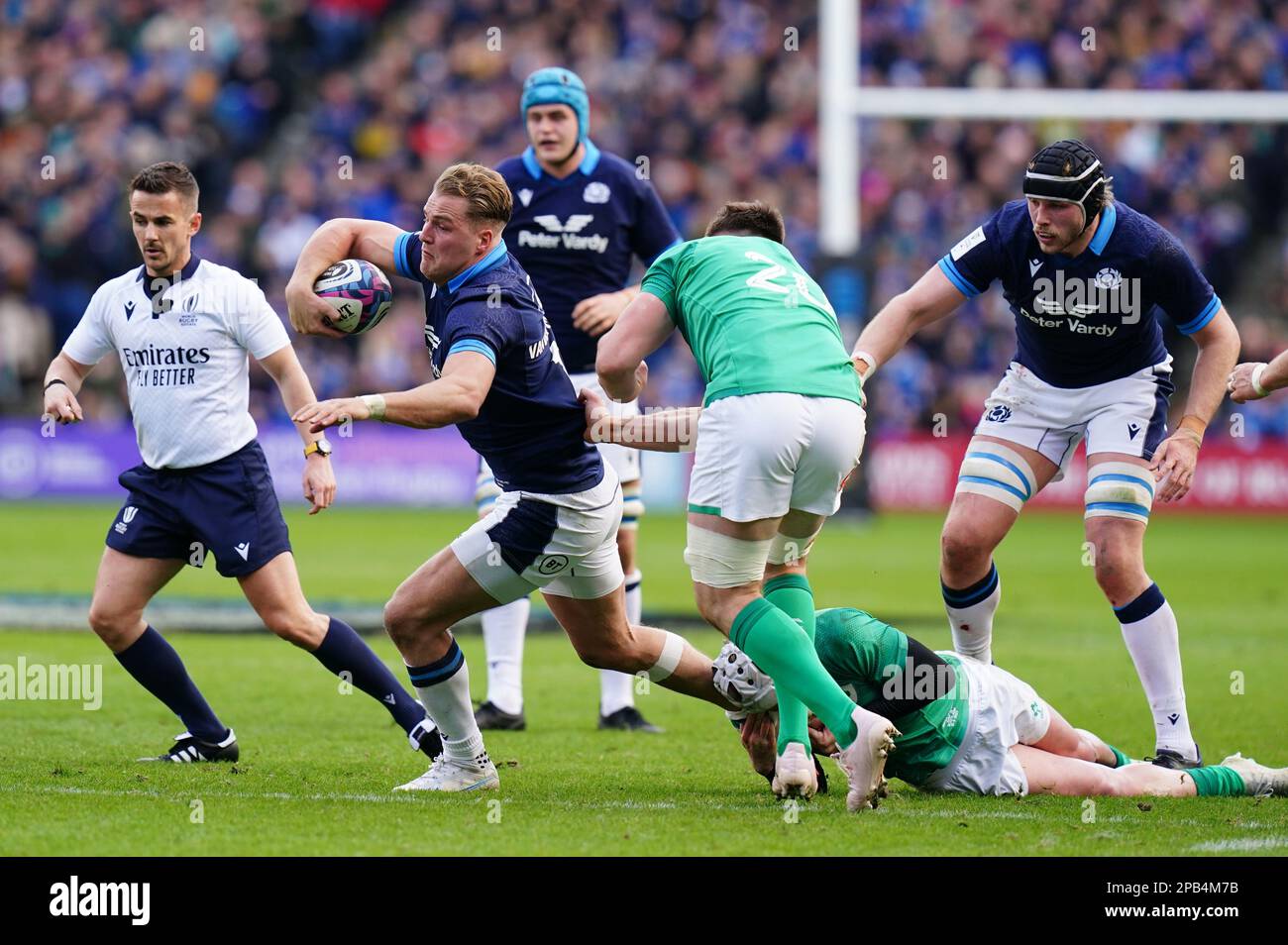 Scotland’s Duhan van de Merwe gets past Ireland’s Jack Conan during the ...