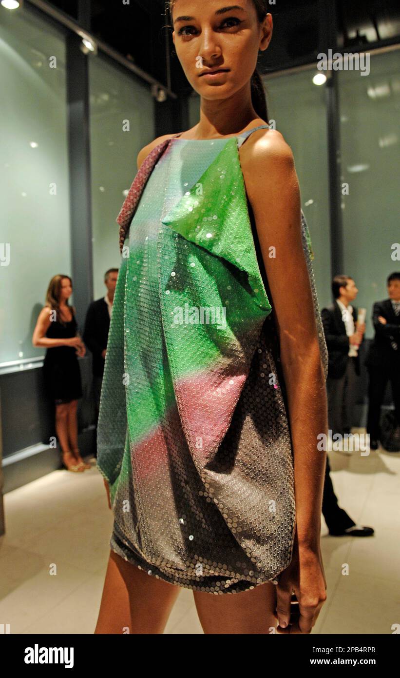 A model wears a creation of designer Vivienne Tam for the presentation ...