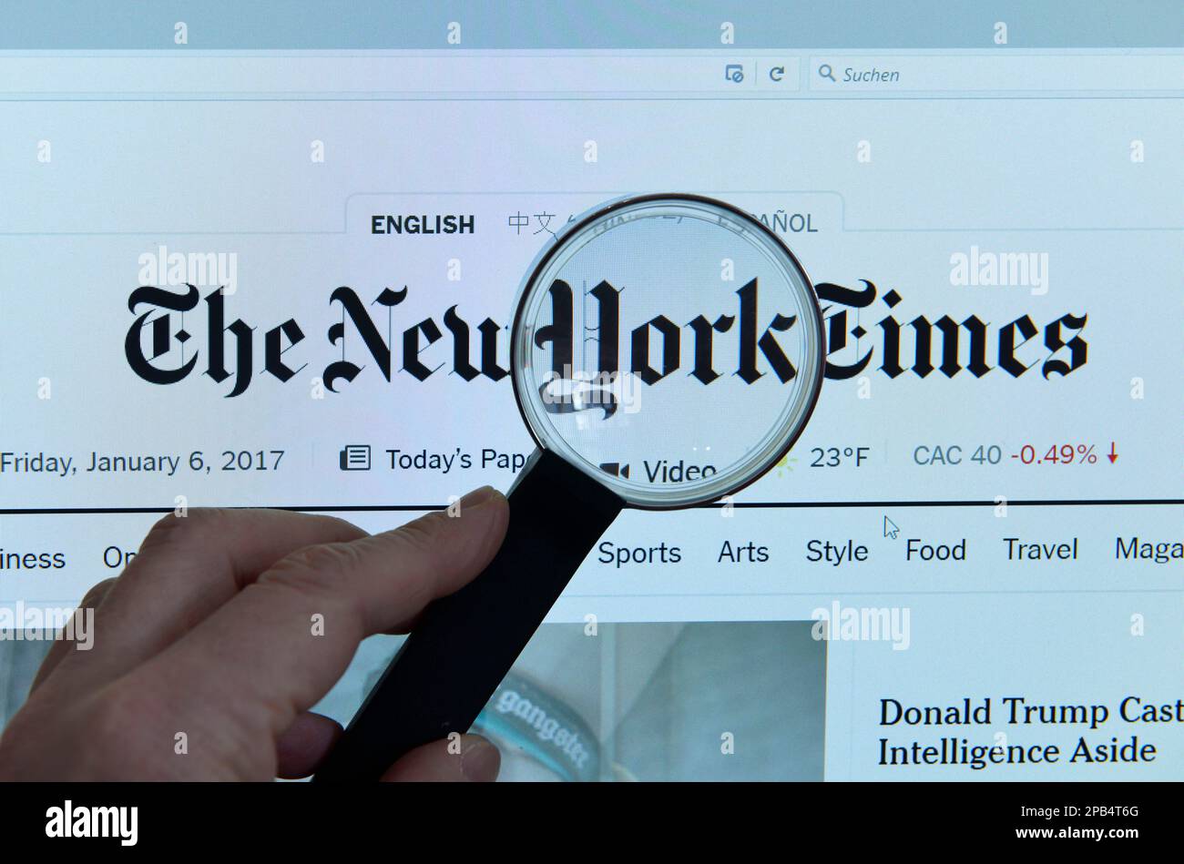 The New York Times, Internet, screen, Hand, Magnifier Stock Photo - Alamy