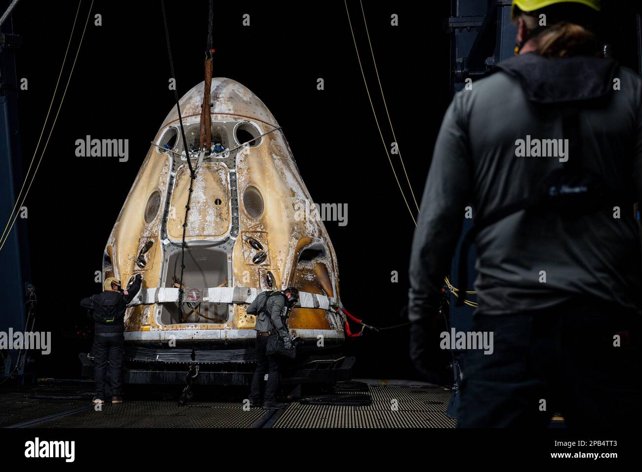 Support teams onboard the SpaceX recovery ship Shannon work around the ...