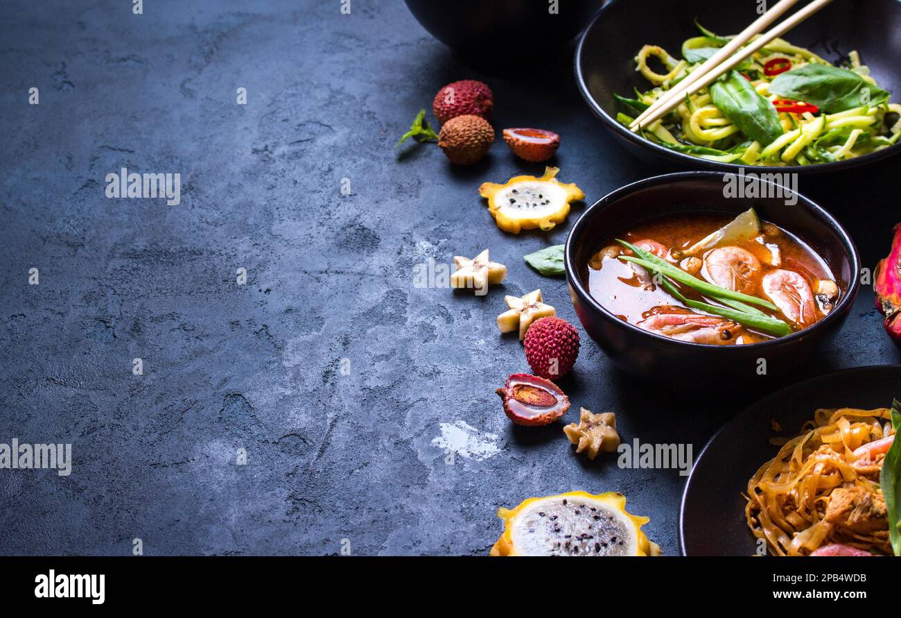 Thai food background. Dishes of thai cuisine. Tom yum soup, pad thai ...