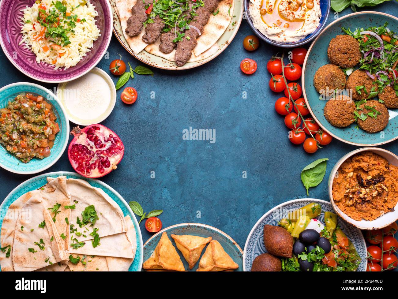 Middle eastern or arabic dishes and assorted meze on concrete rustic ...