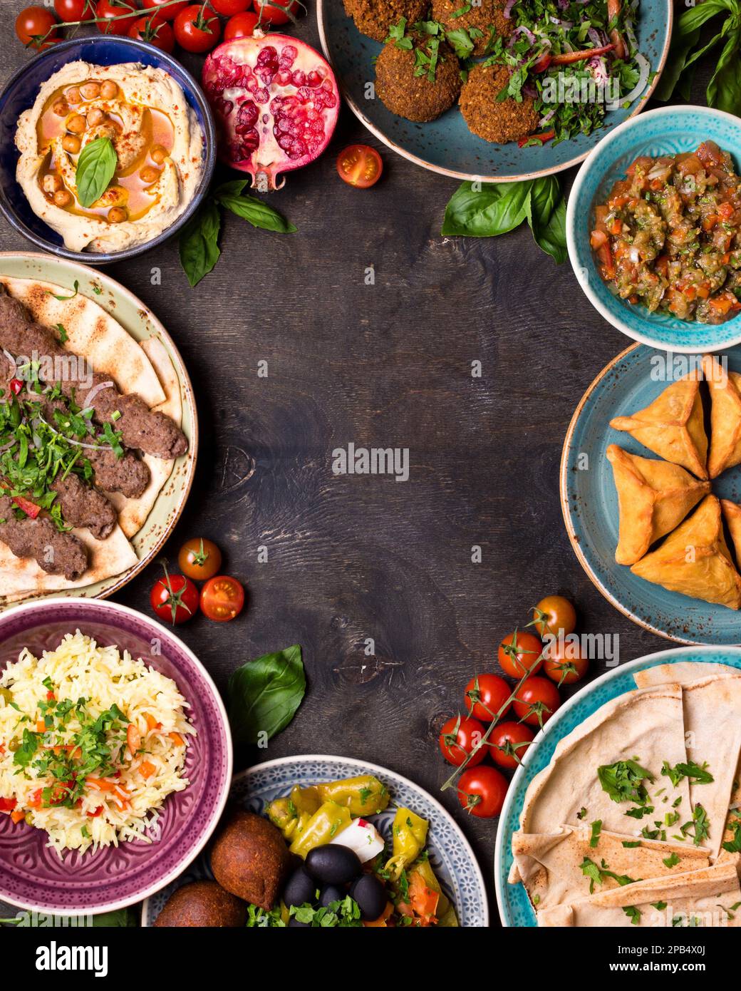 Middle eastern or arabic dishes and assorted meze on a dark background ...