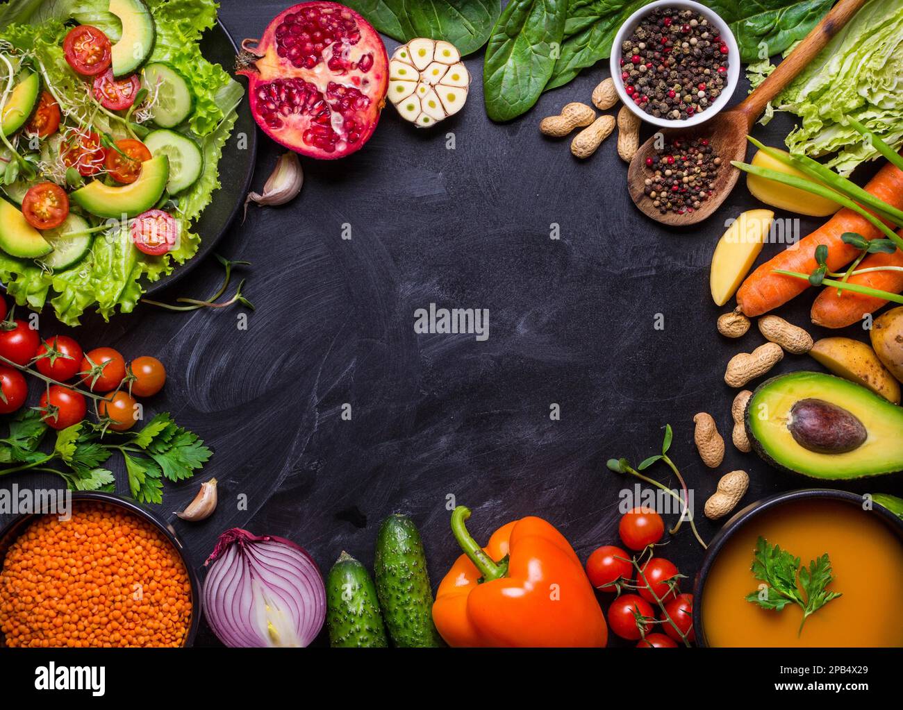 Vegan food and dishes. Pumpkin soup, salad, vegetables, fruits, lentils ...