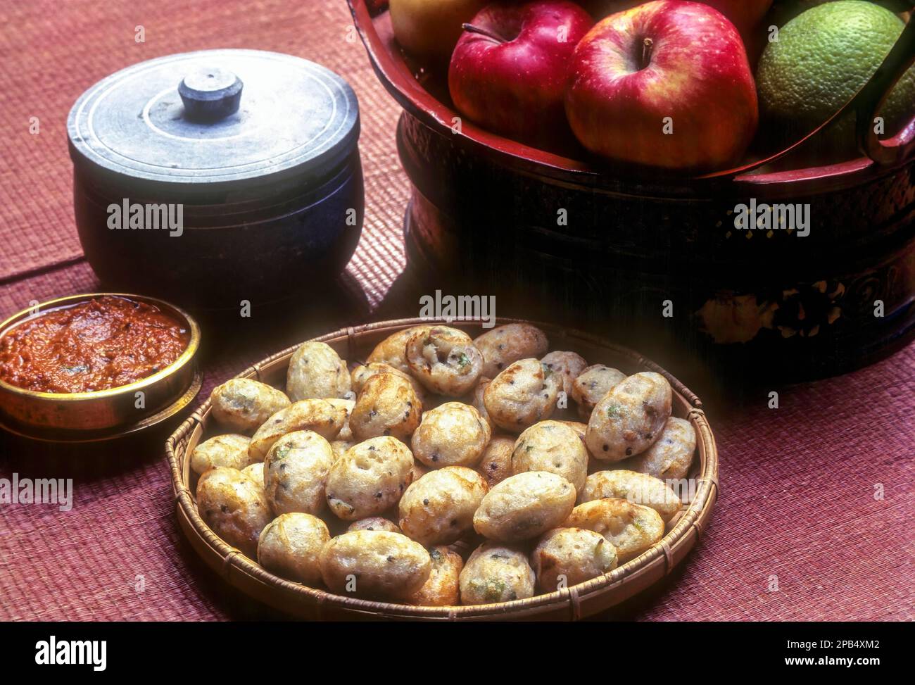 Traditional Chettinad food, kulipaniyaram with red chutney, Tamil Nadu ...