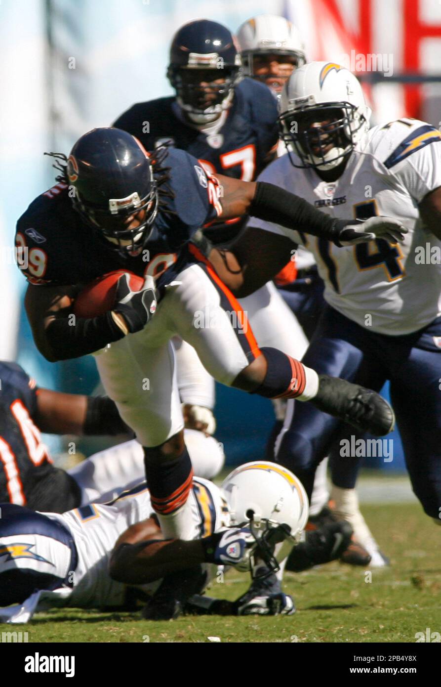 Chicago Bears running back Adrian Peterson (29) breaks a tackle attempt ...