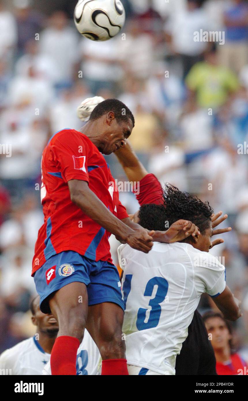 Costa Rica's Gabriel Badilla, left, battles Honduras' Carlo Costly for ...