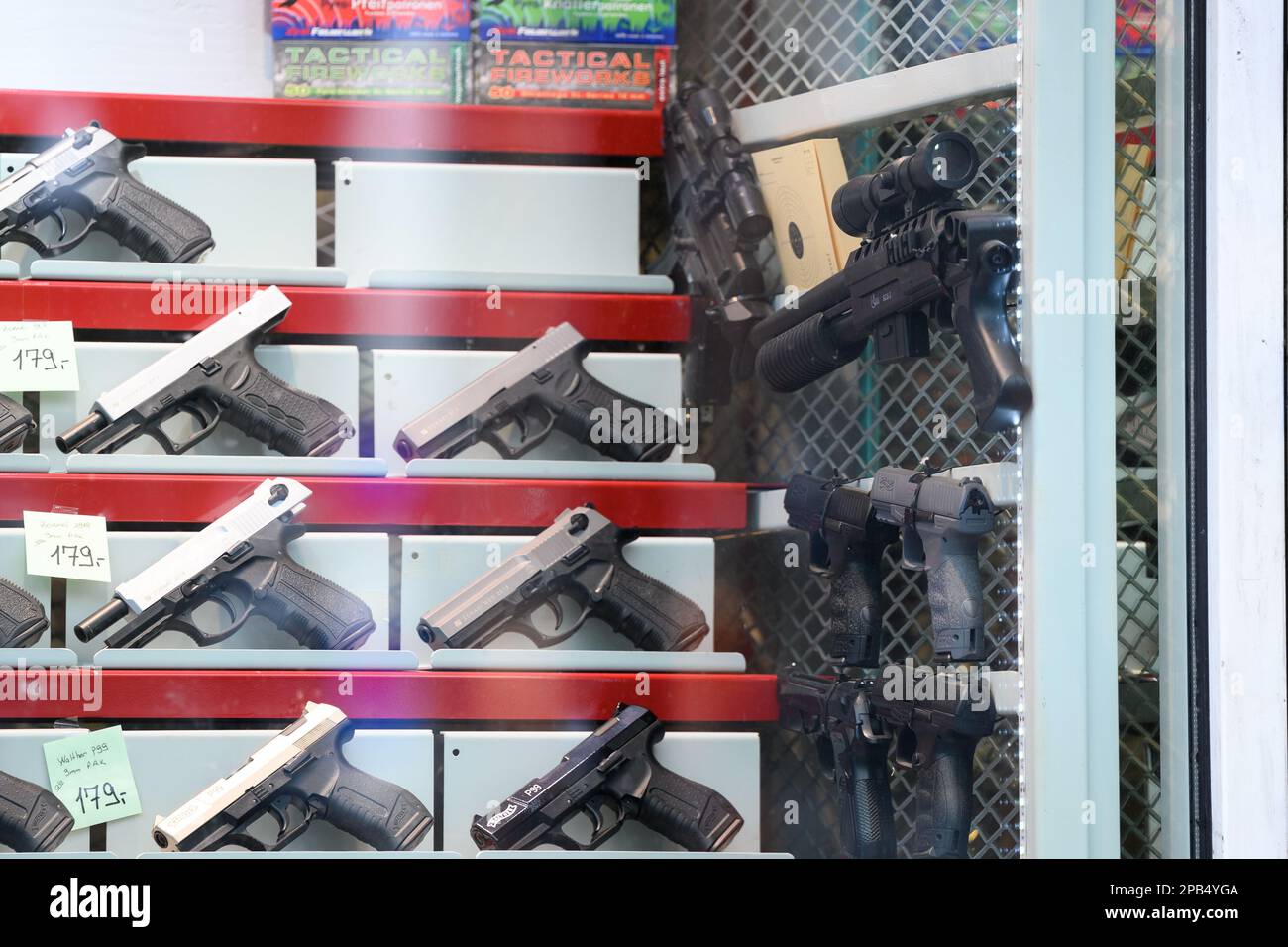 Hamburg, Germany. 12th Mar, 2023. The display of a gun store selling ...