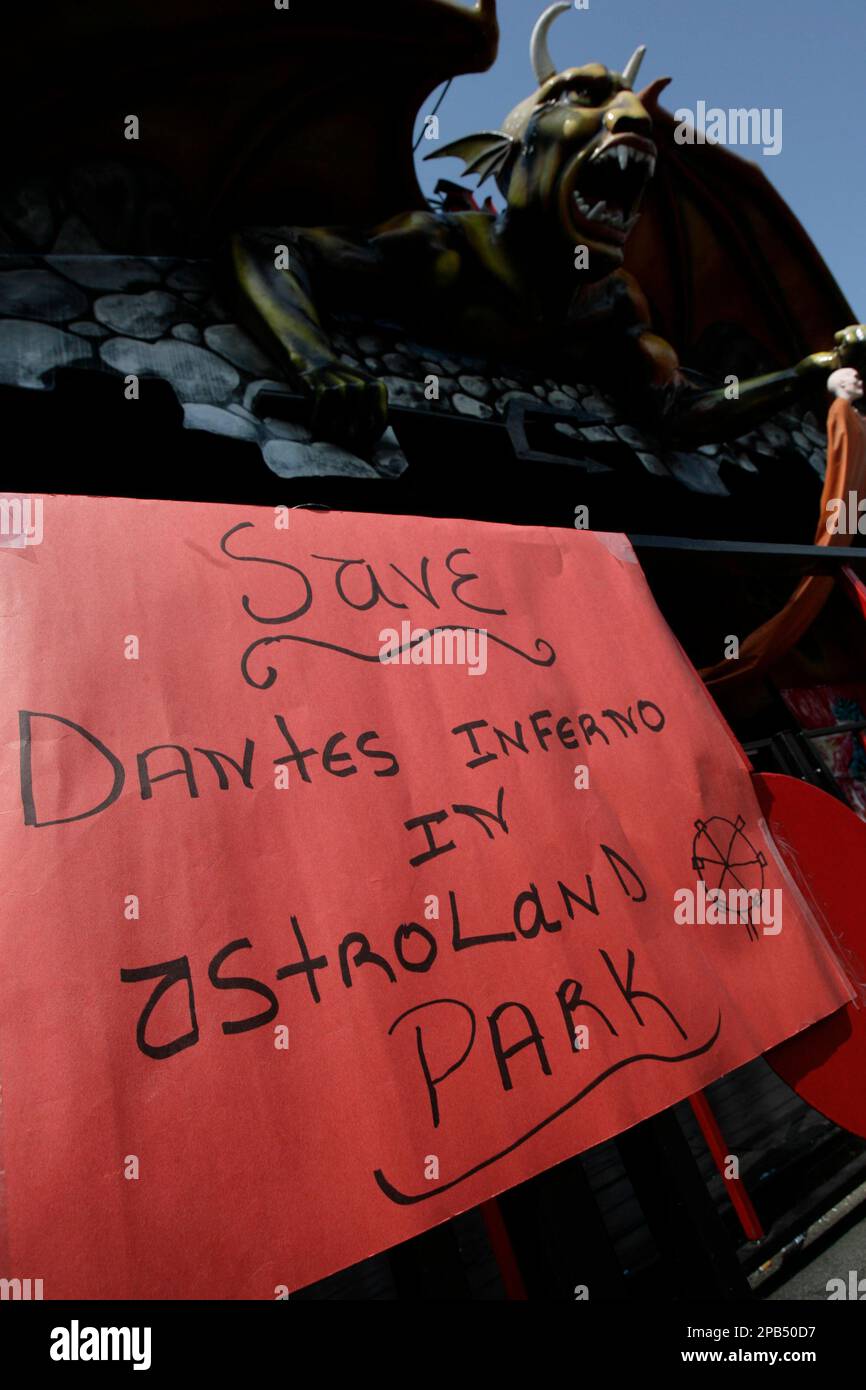 A sign hangs on the fence of the Dante's Inferno ride at Astroland ...