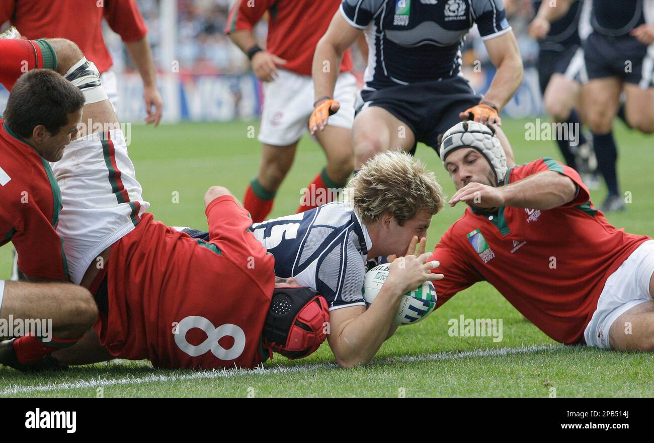 Scotland's Rory Lamont touches down for the opening try during the the ...