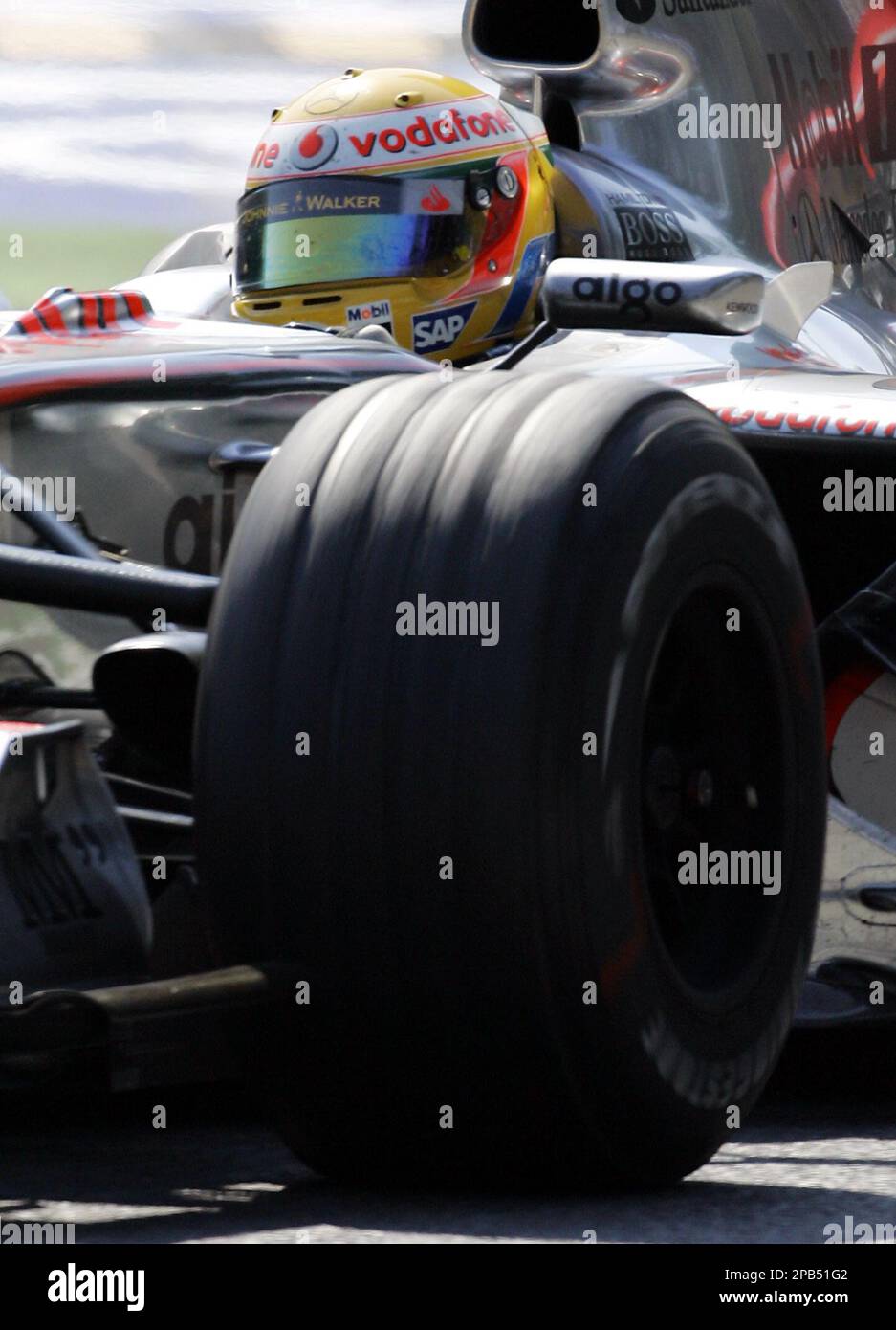 Britain's Lewis Hamilton steers his McLaren Mercedes, during the ...