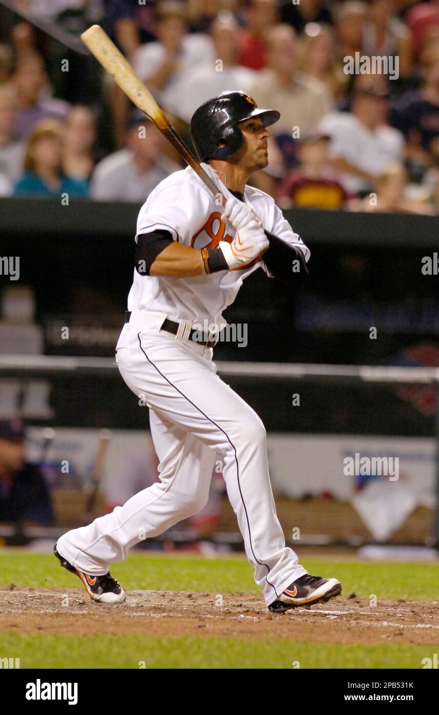 Baltimore Orioles' Brian Roberts follows through on a double against ...