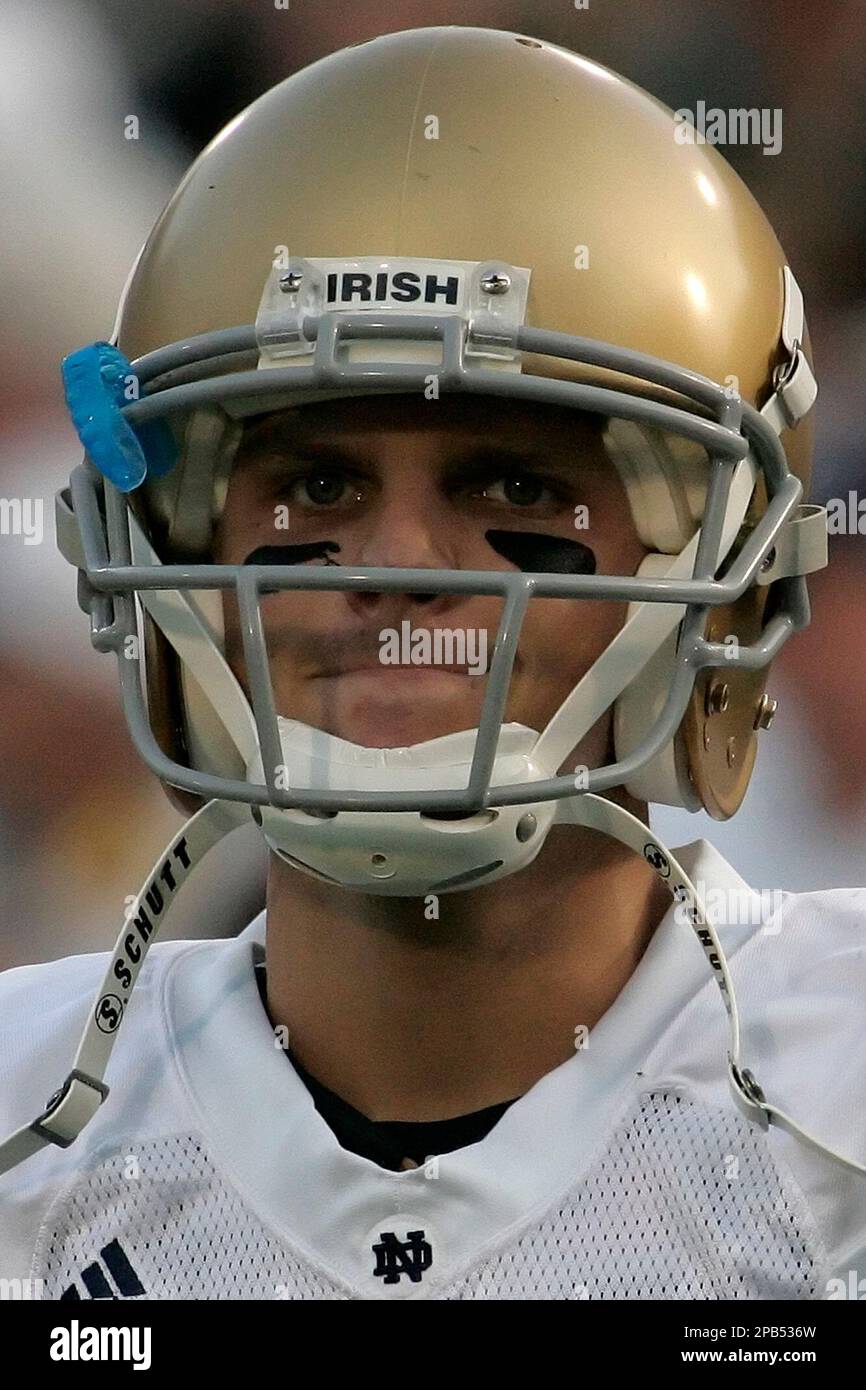 Notre Dame quarterback Jimmy Clausen (7) walks on the field in the ...