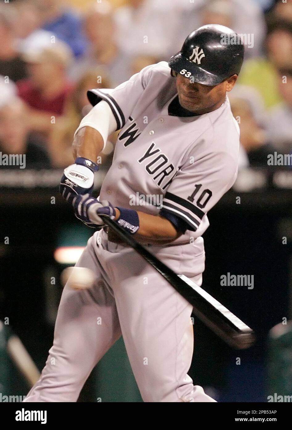 New York Yankees' Bobby Abreu doubles, scoring Alberto Gonzalez and ...