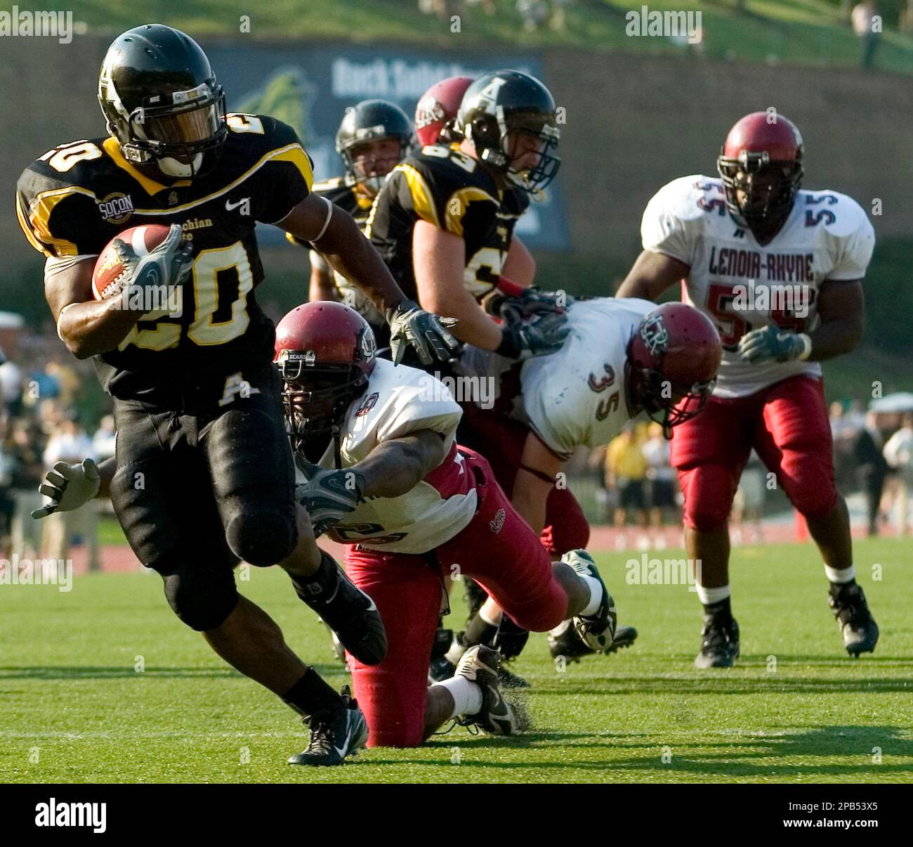 Appalachian State's Devon Moore (20) runs past Lenoir-Rhyne's Austin ...