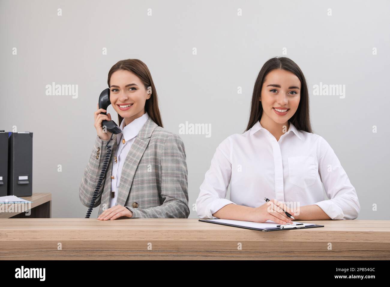 Receptionists desk hi-res stock photography and images - Alamy