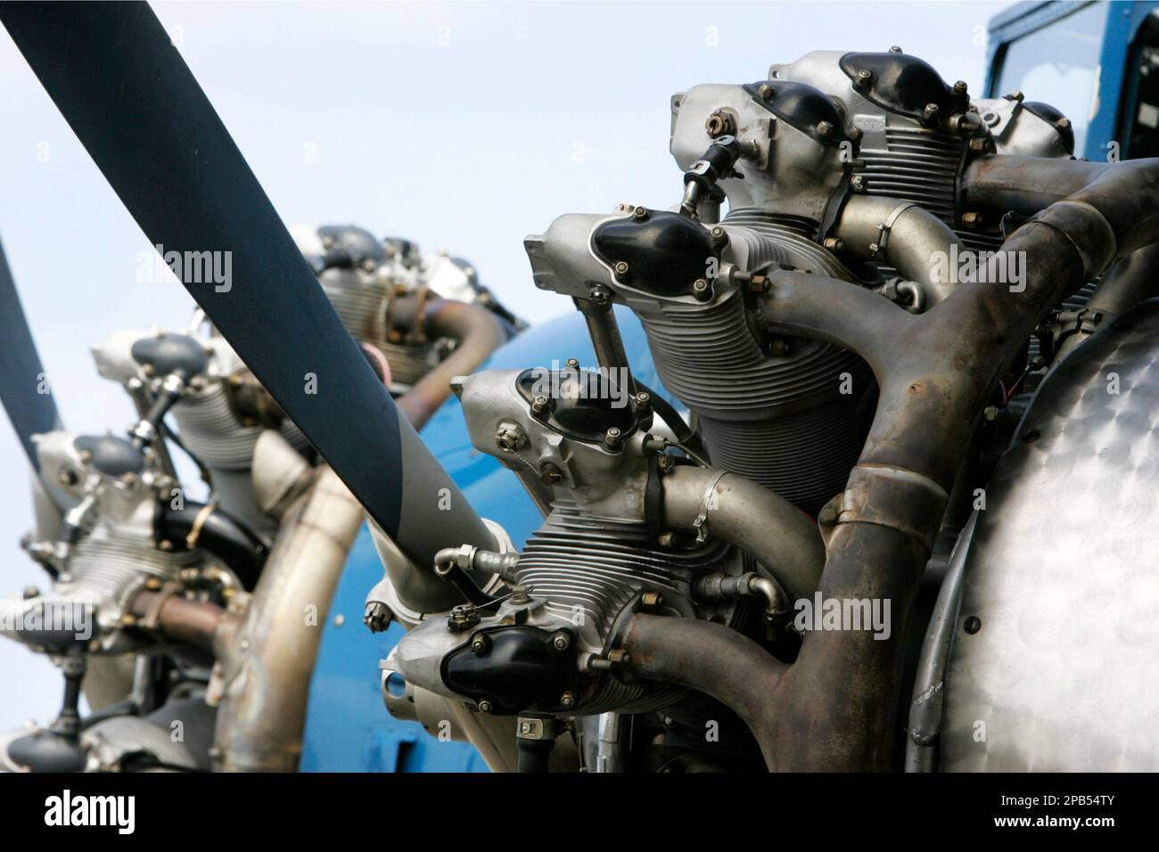 Pratt & Whitney nine-cylinder engines are shown mounted on a 1929 Ford ...