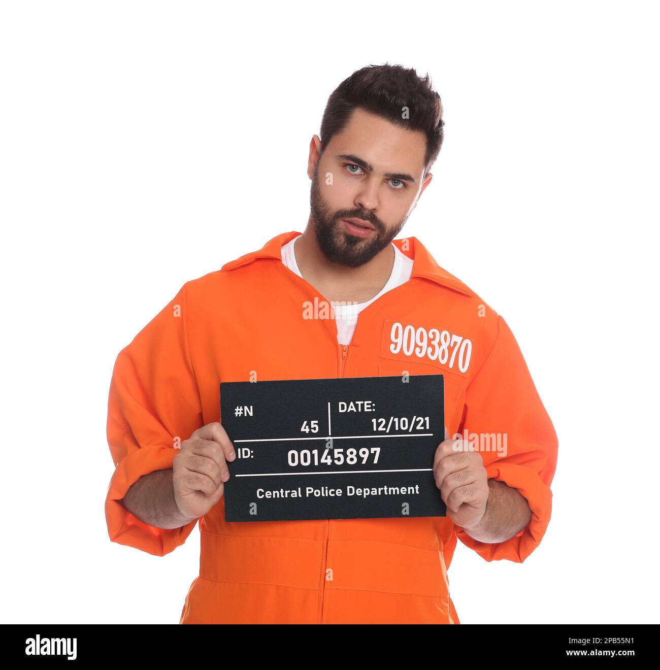 Prisoner with mugshot letter board on white background Stock Photo - Alamy