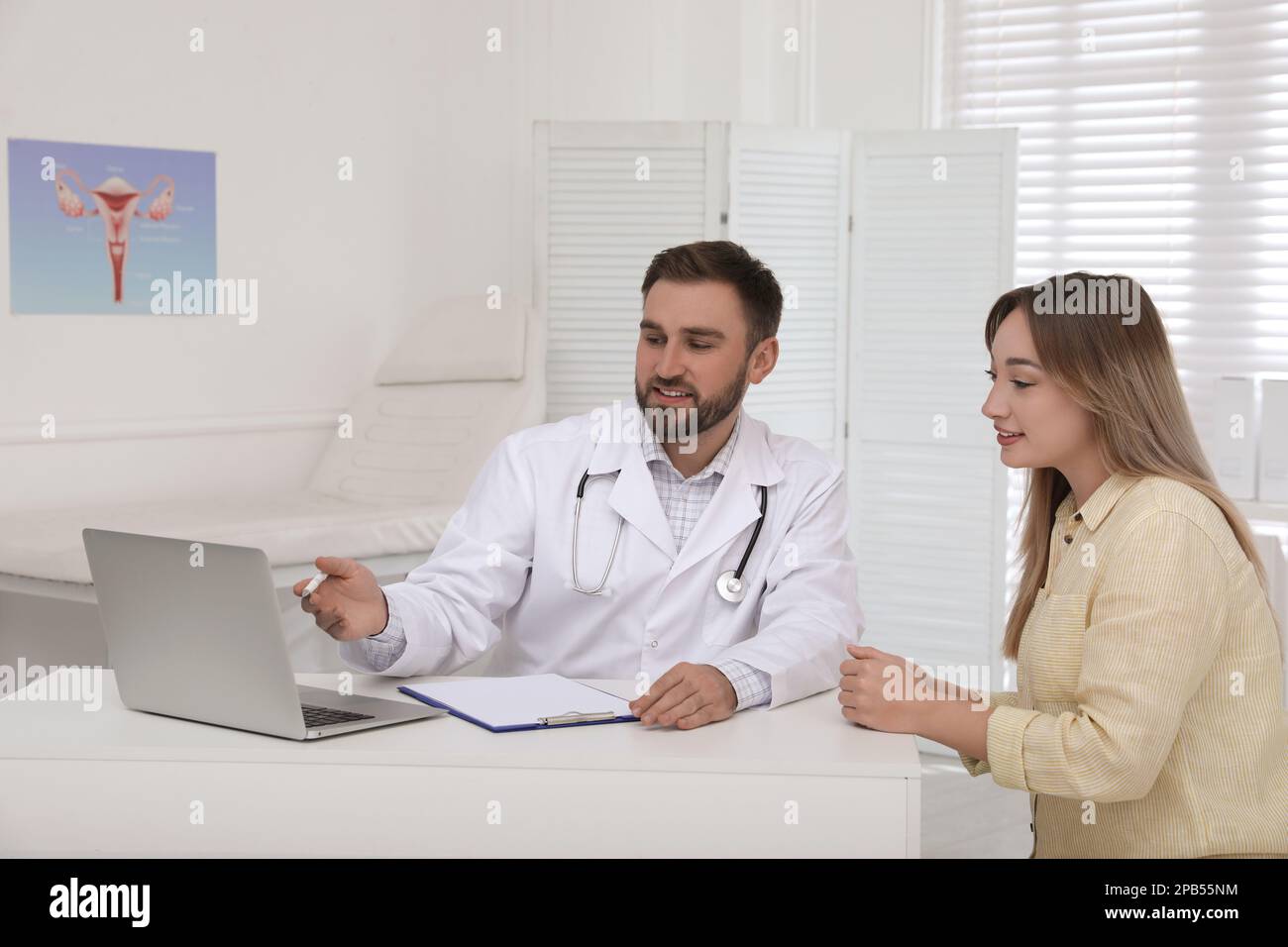 Young woman having appointment in gynecologist office Stock Photo - Alamy