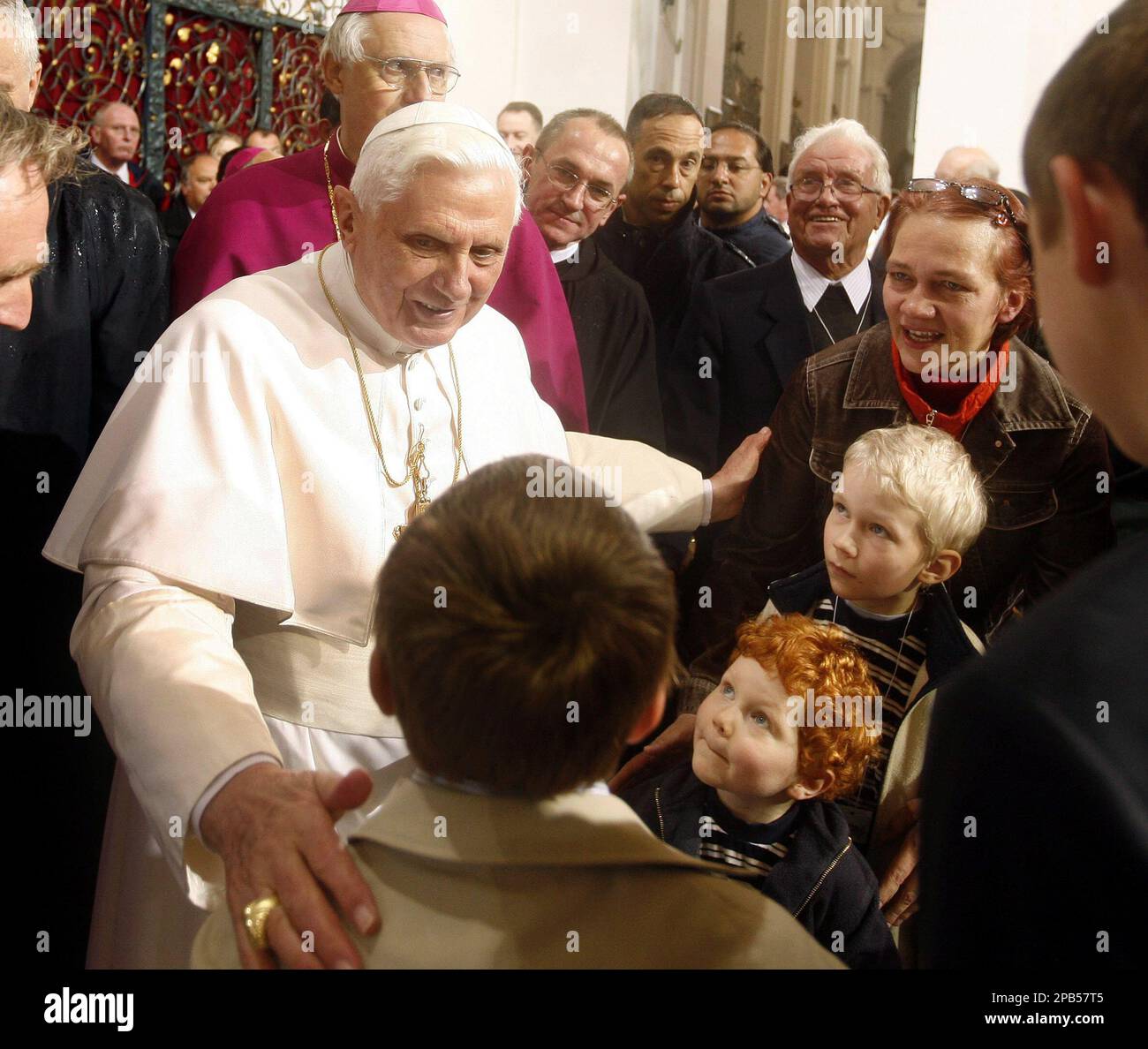 Pope Benedict XVI talks to pilgrims when arriving at the Basilika in ...
