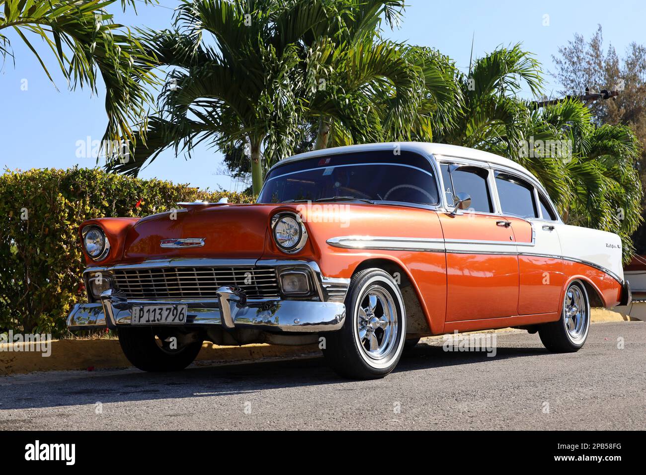 Vintage classic car Chevrolet parked on a road on palm trees background Stock Photo - Alamy