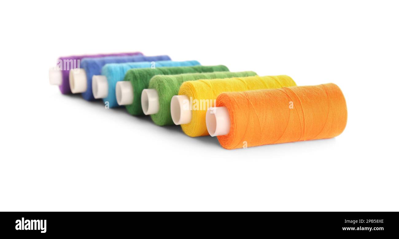 Set of colorful sewing threads on white background Stock Photo - Alamy