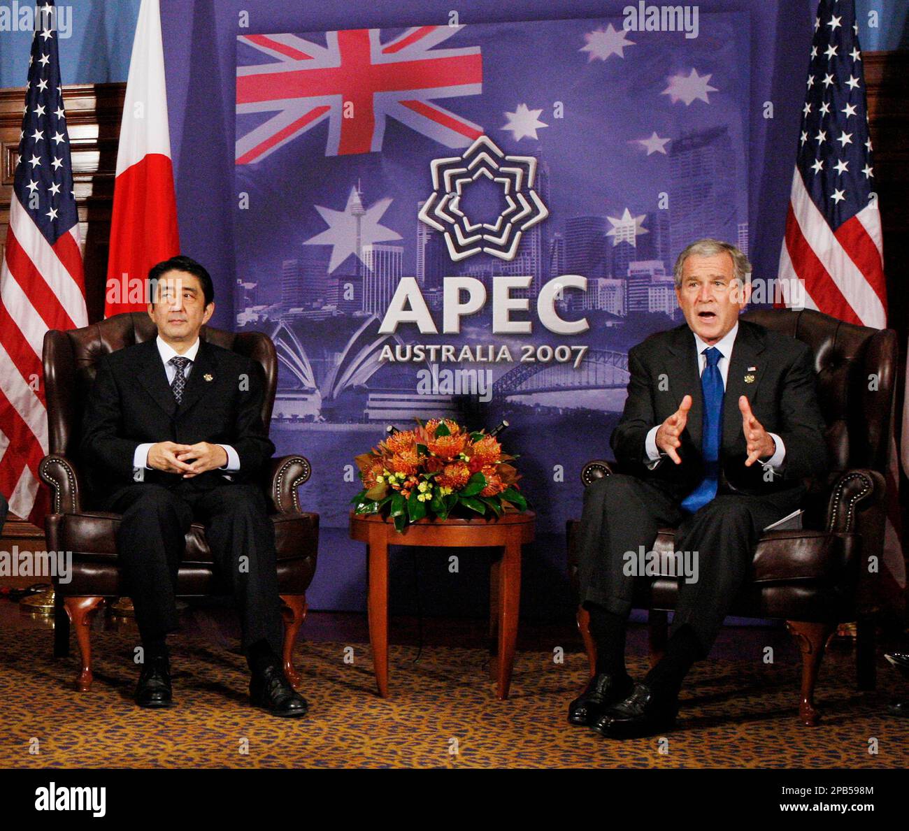 President Bush, right, makes a statement to reporters as Japanese Prime ...