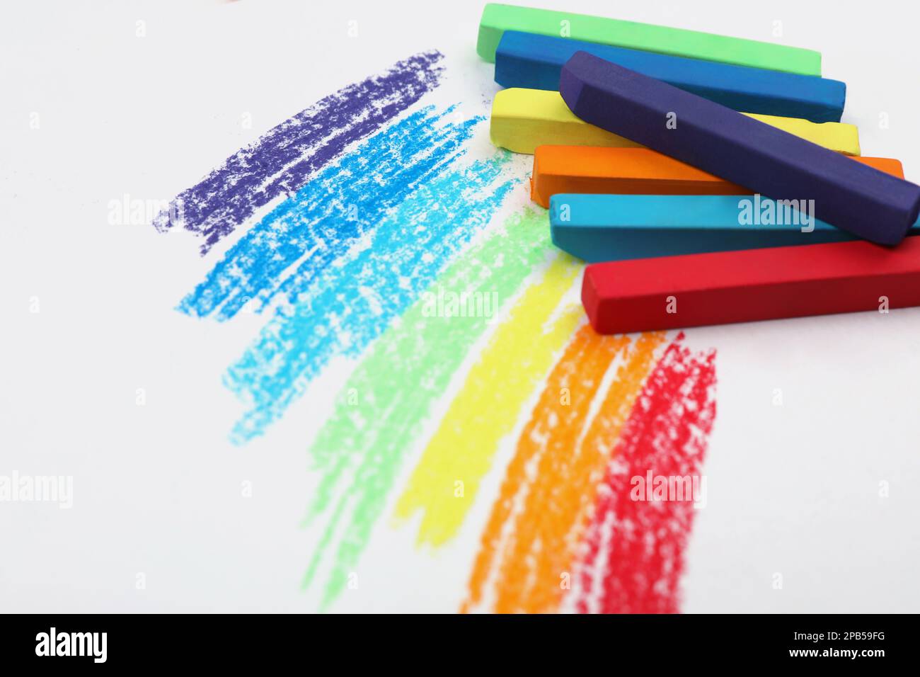 Colorful pastel chalks and scribbles on white background. Drawing ...