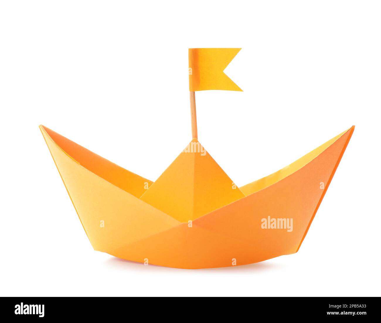 Handmade orange paper boat with flag isolated on white. Origami art ...