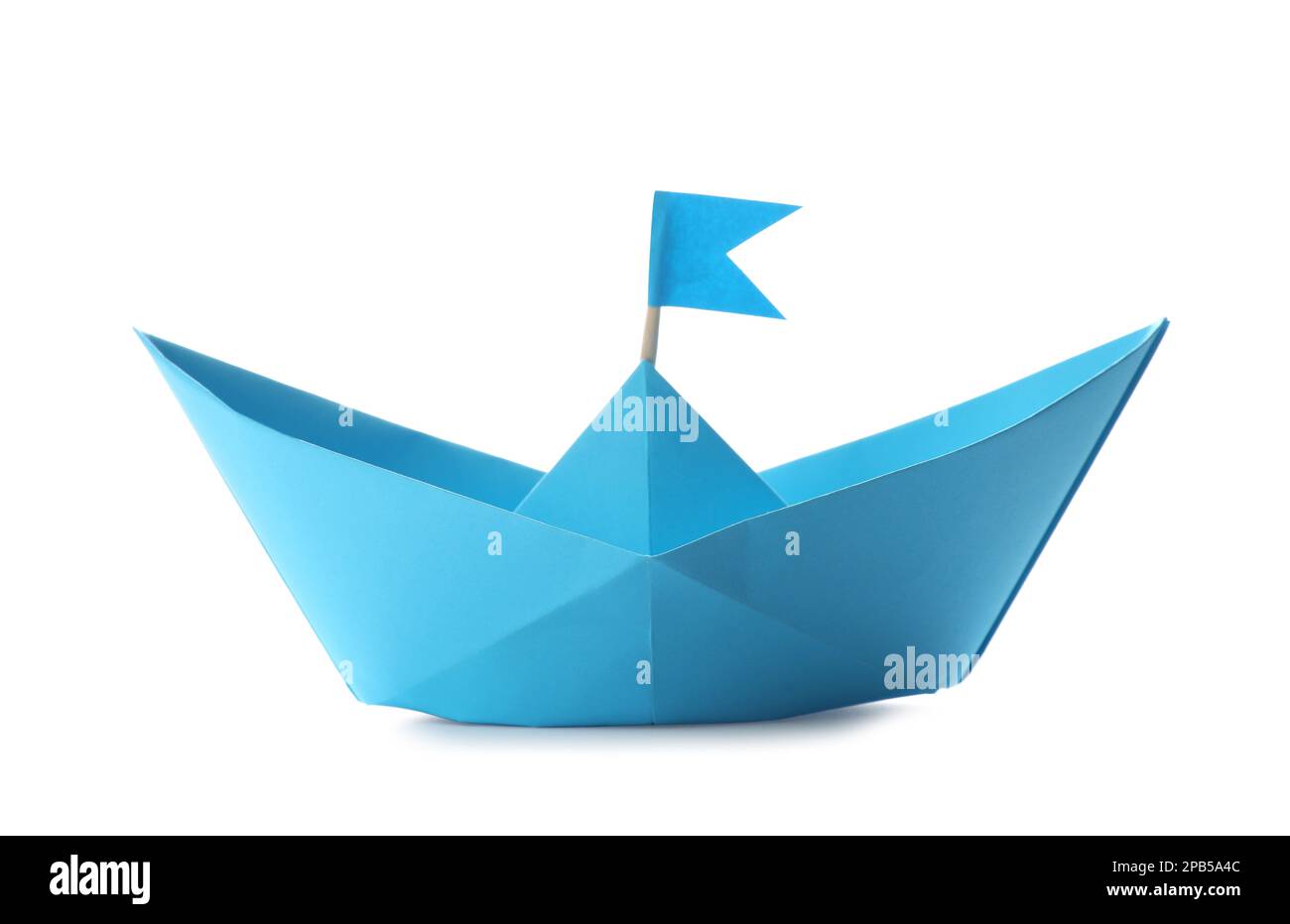 Handmade light blue paper boat with flag isolated on white. Origami art ...
