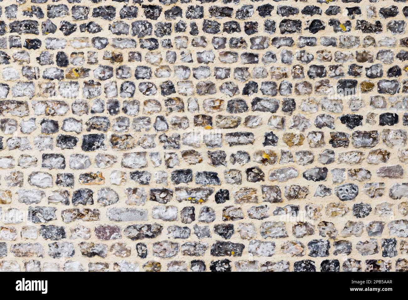 background texture of a typical flintstone masonry in Normandy, France ...