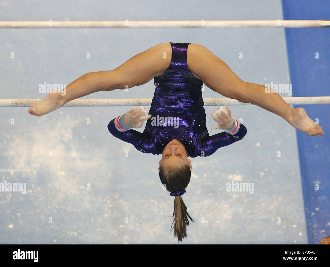 U.S. Shawn Johnson competes on the uneven bars the Women's Individual ...
