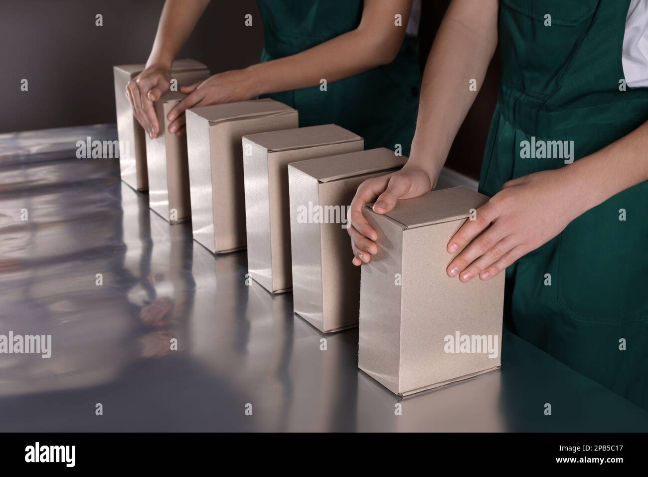 Production line boxes hi-res stock photography and images - Alamy
