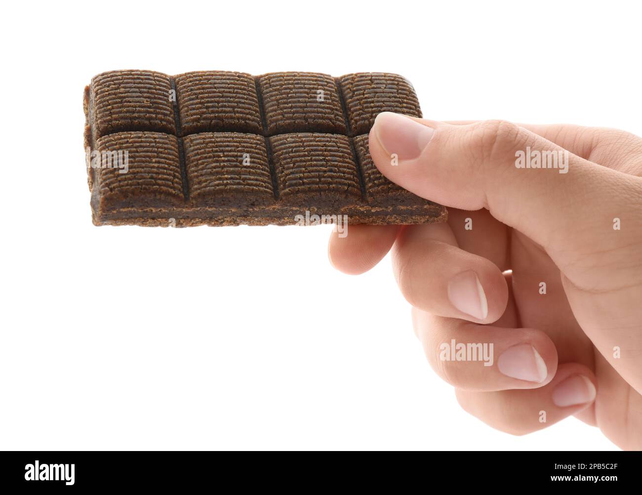 Woman holding hematogen bar on white background, closeup Stock Photo ...