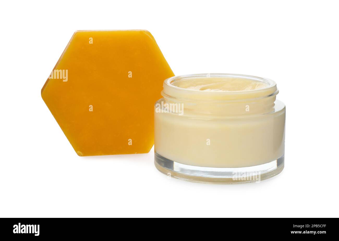 Cream and natural beeswax on white background Stock Photo - Alamy