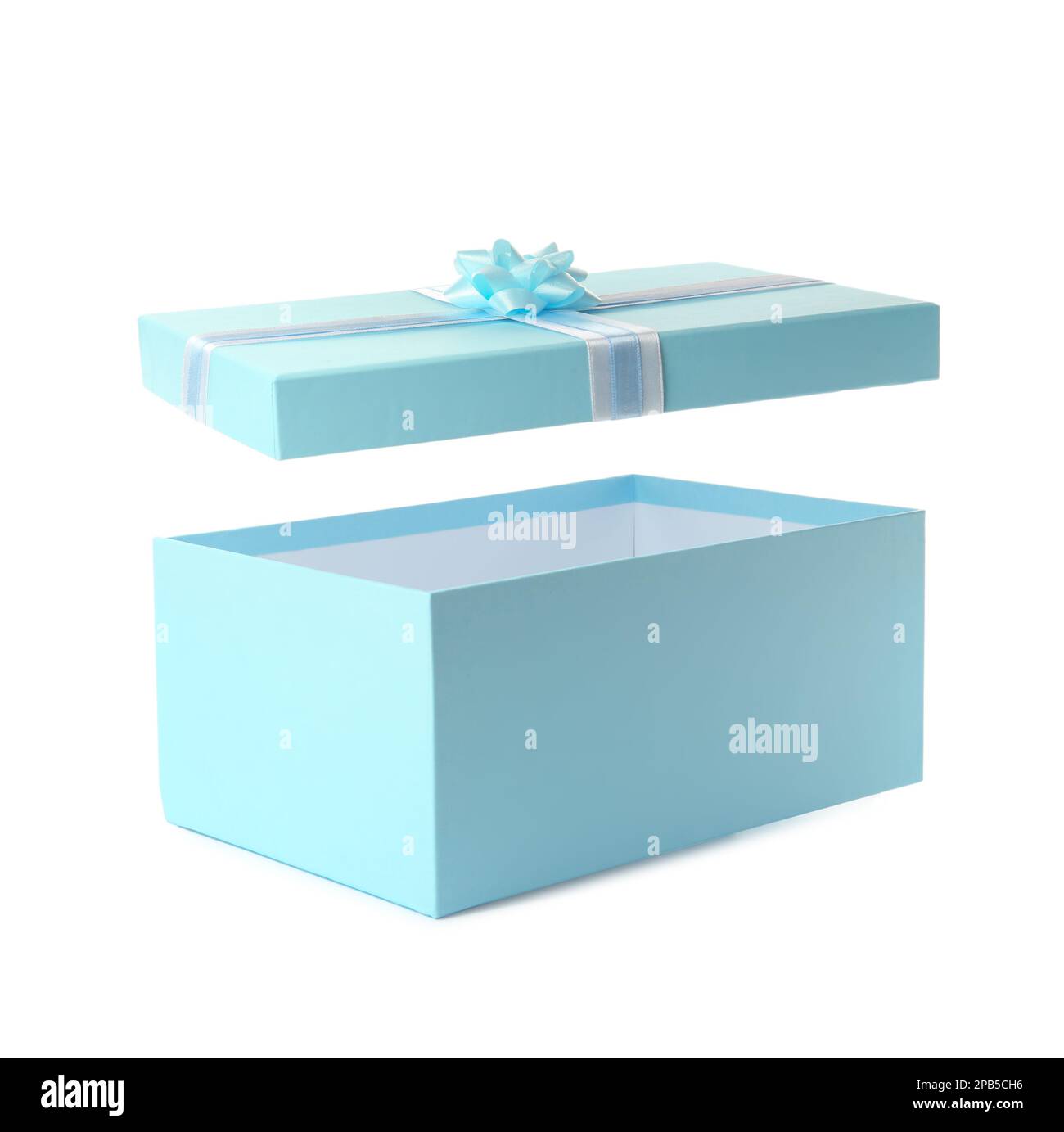 Light blue gift box and lid with bow on white background Stock Photo ...