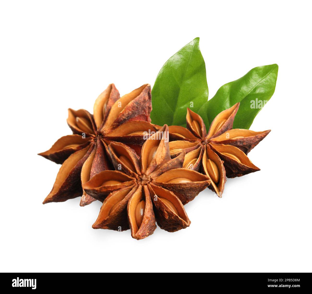 Aromatic dry anise stars and green leaves on white background Stock ...