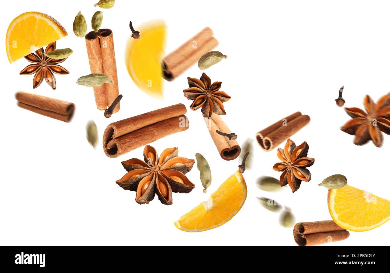 Pieces of fresh orange, aromatic anise stars, cinnamon, cloves and ...