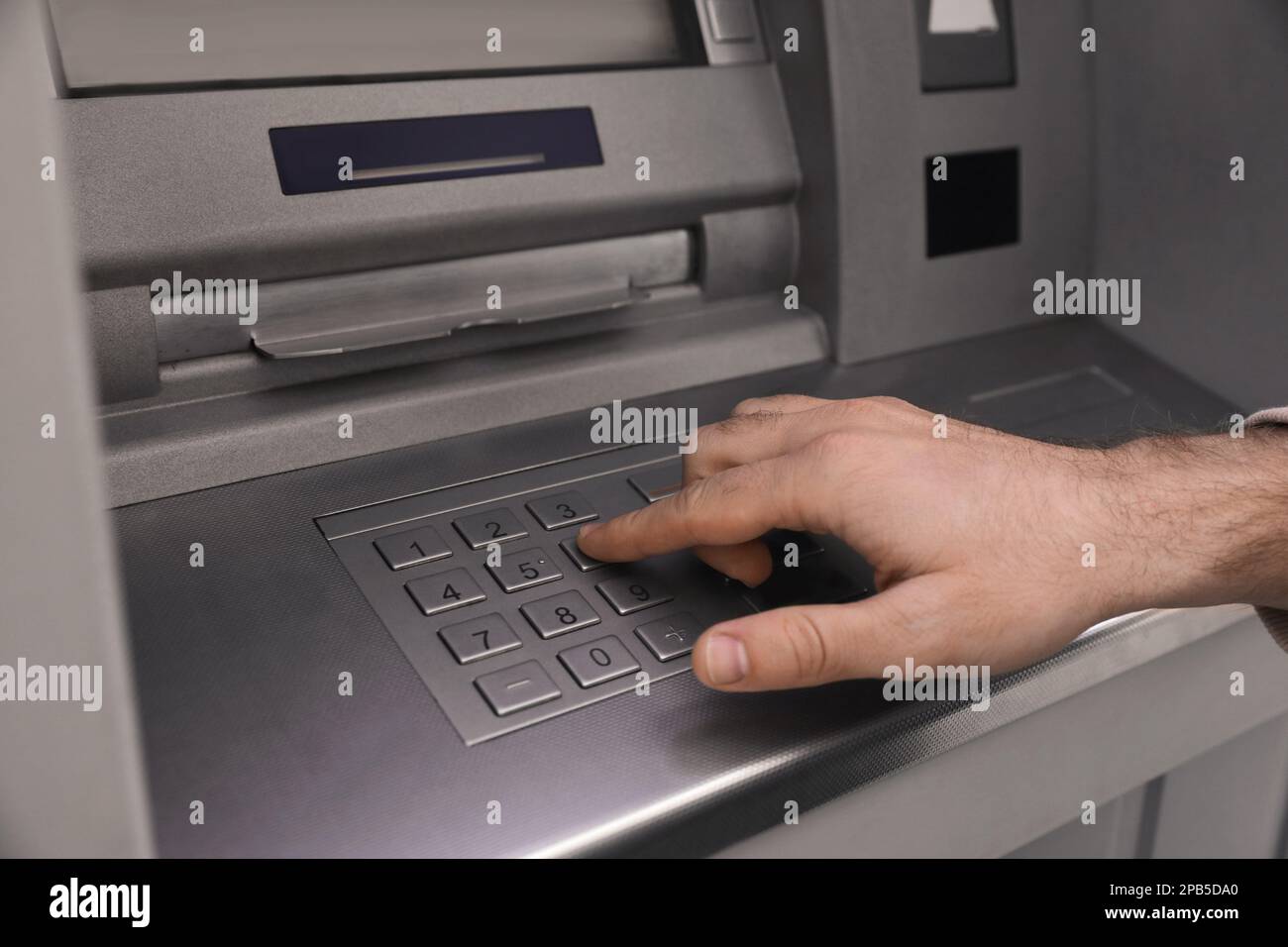 Entering pin cash machine hi-res stock photography and images - Alamy