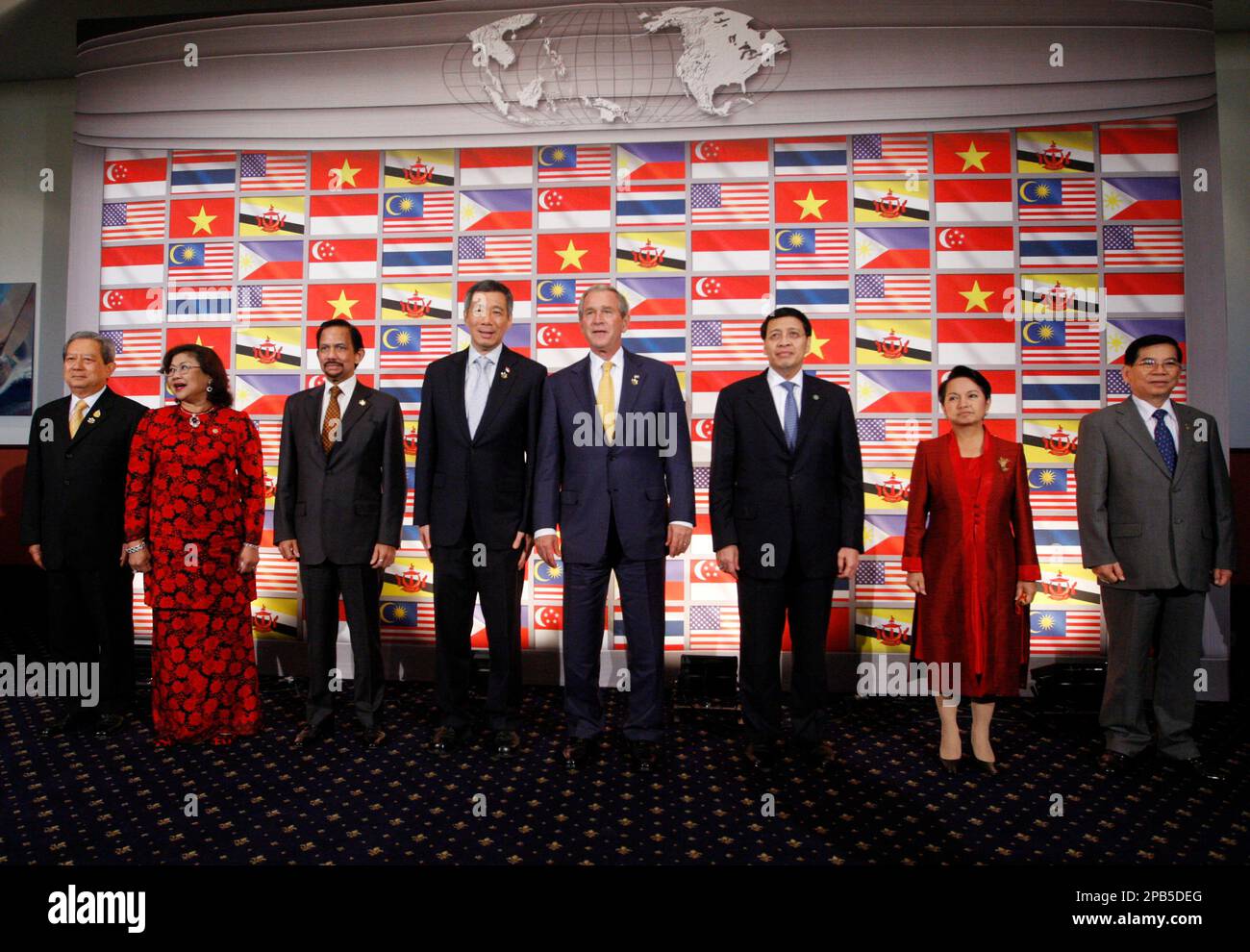 President Bush, center, poses for a photo after his meeting with ...
