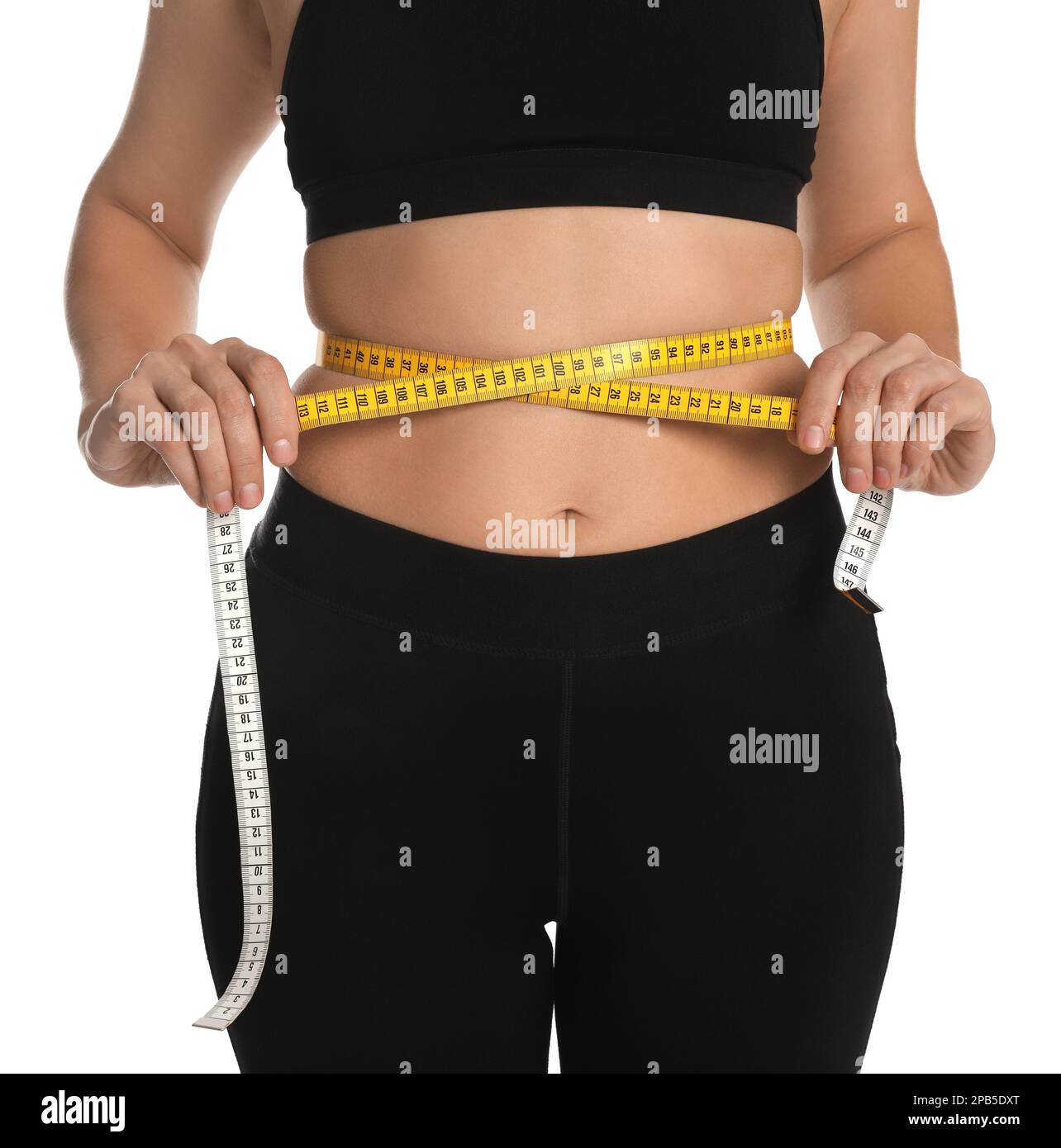 Woman measuring waist with tape on white background, closeup Stock ...