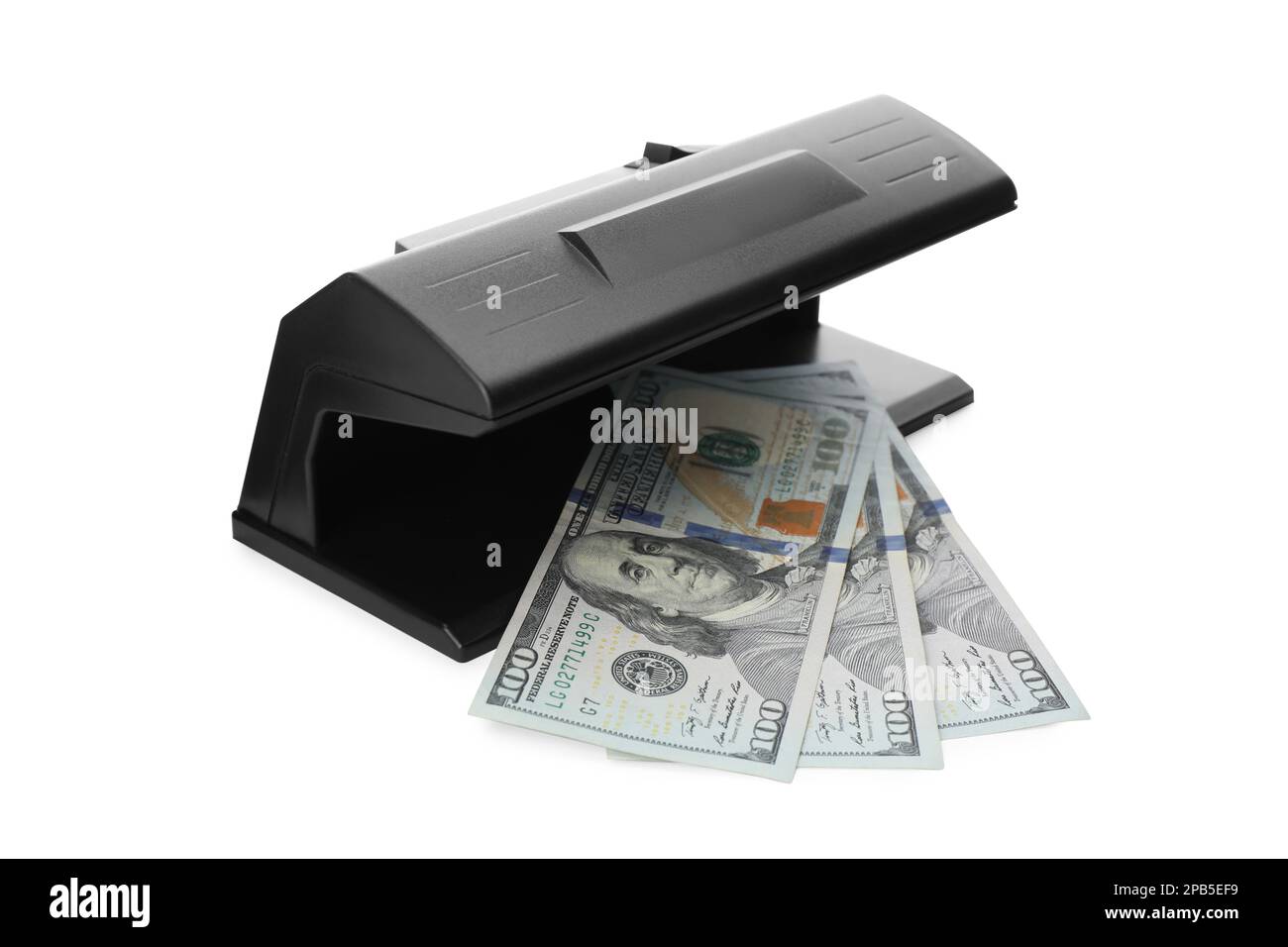 Modern currency detector with dollar banknotes isolated on white. Money ...