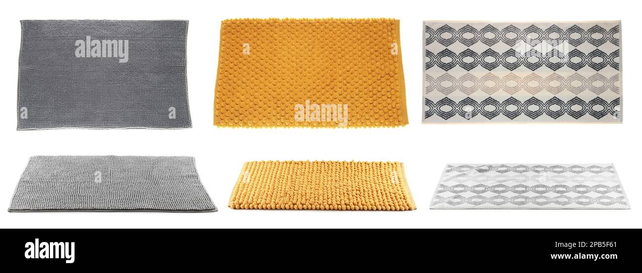 Set with soft bath mats on white background. Banner design Stock Photo ...