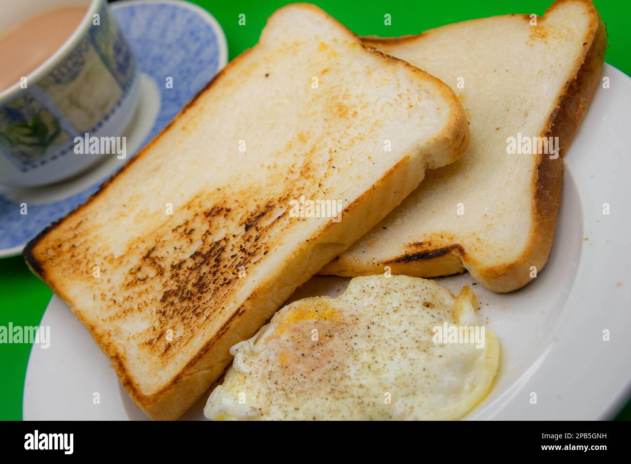 English Breakfast - Tea with Egg and Toast , Honey / Jam Stock Photo ...