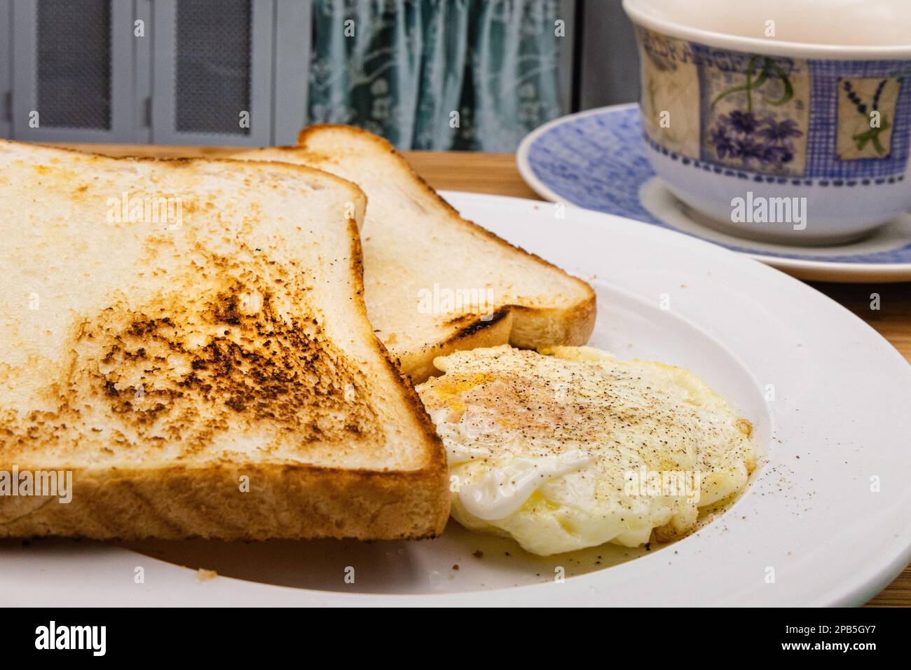 English Breakfast - Tea with Egg and Toast , Honey / Jam Stock Photo ...