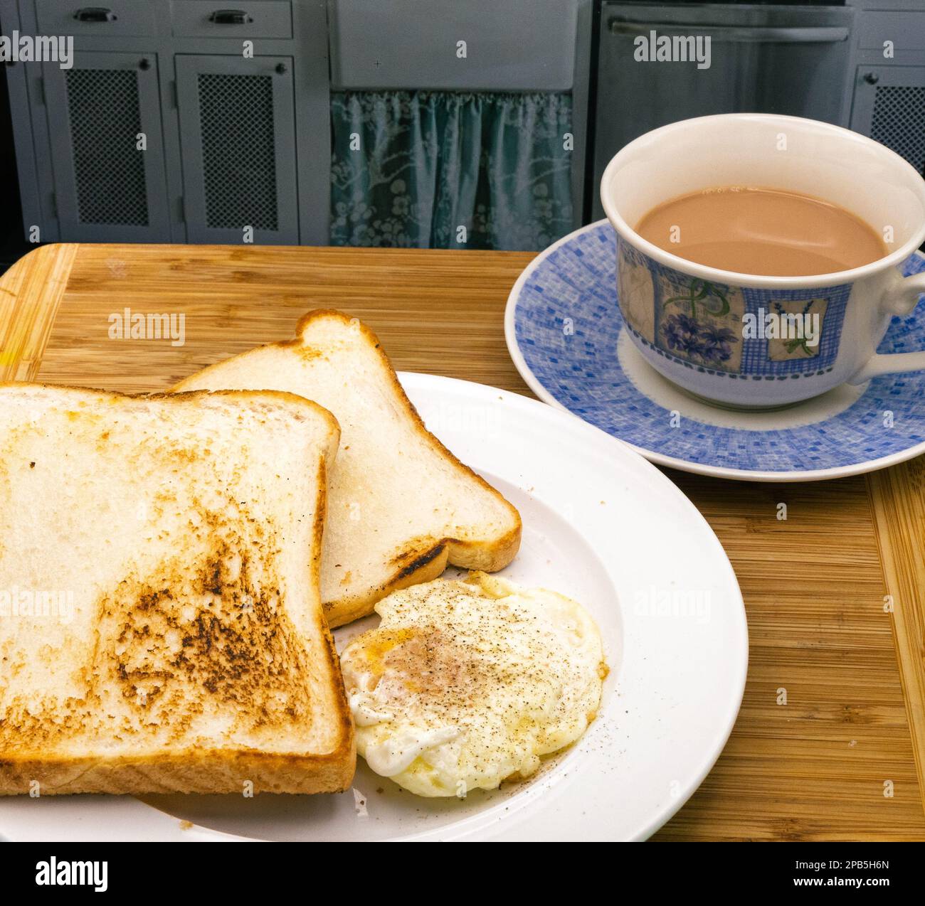 English Breakfast - Tea with Egg and Toast , Honey / Jam Stock Photo ...