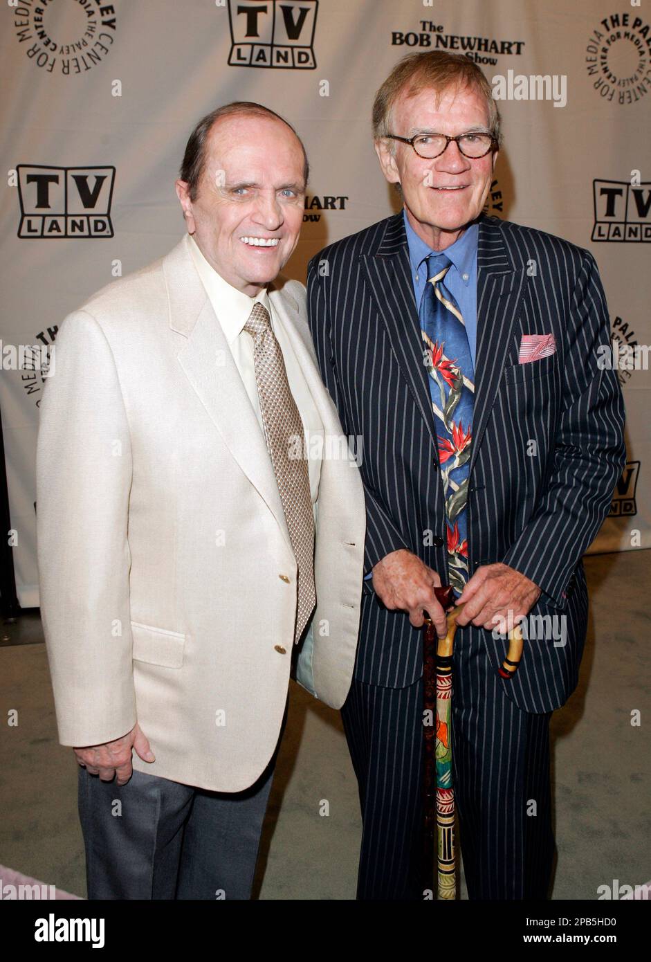 Bob Newhart, left, poses with Jack Riley as they arrive for TV Land's ...