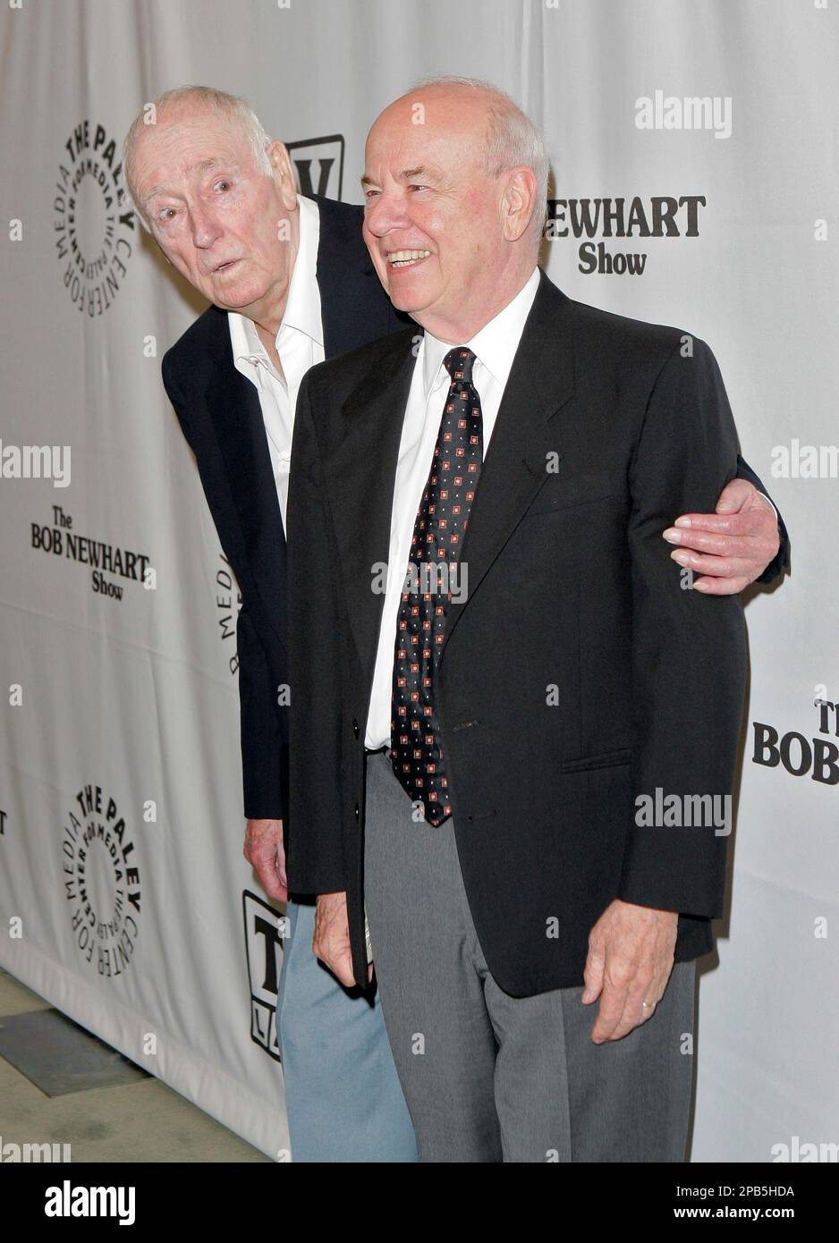 Dick Martin, left, and Tim Conway pose as they arrive for TV Land's ...
