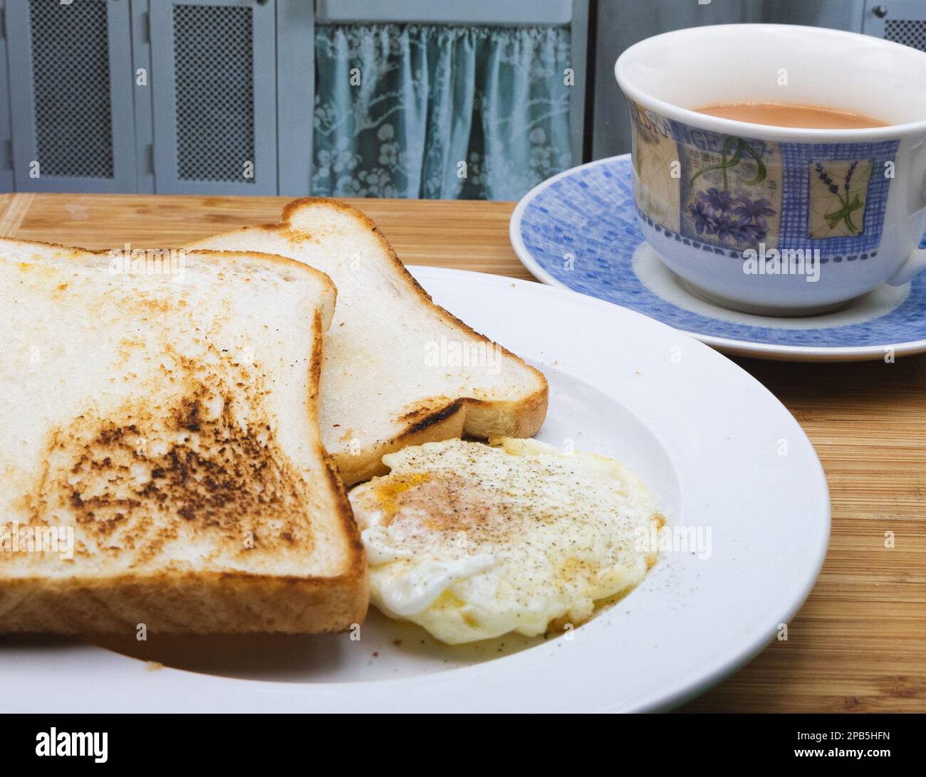 English Breakfast - Tea with Egg and Toast , Honey / Jam Stock Photo ...
